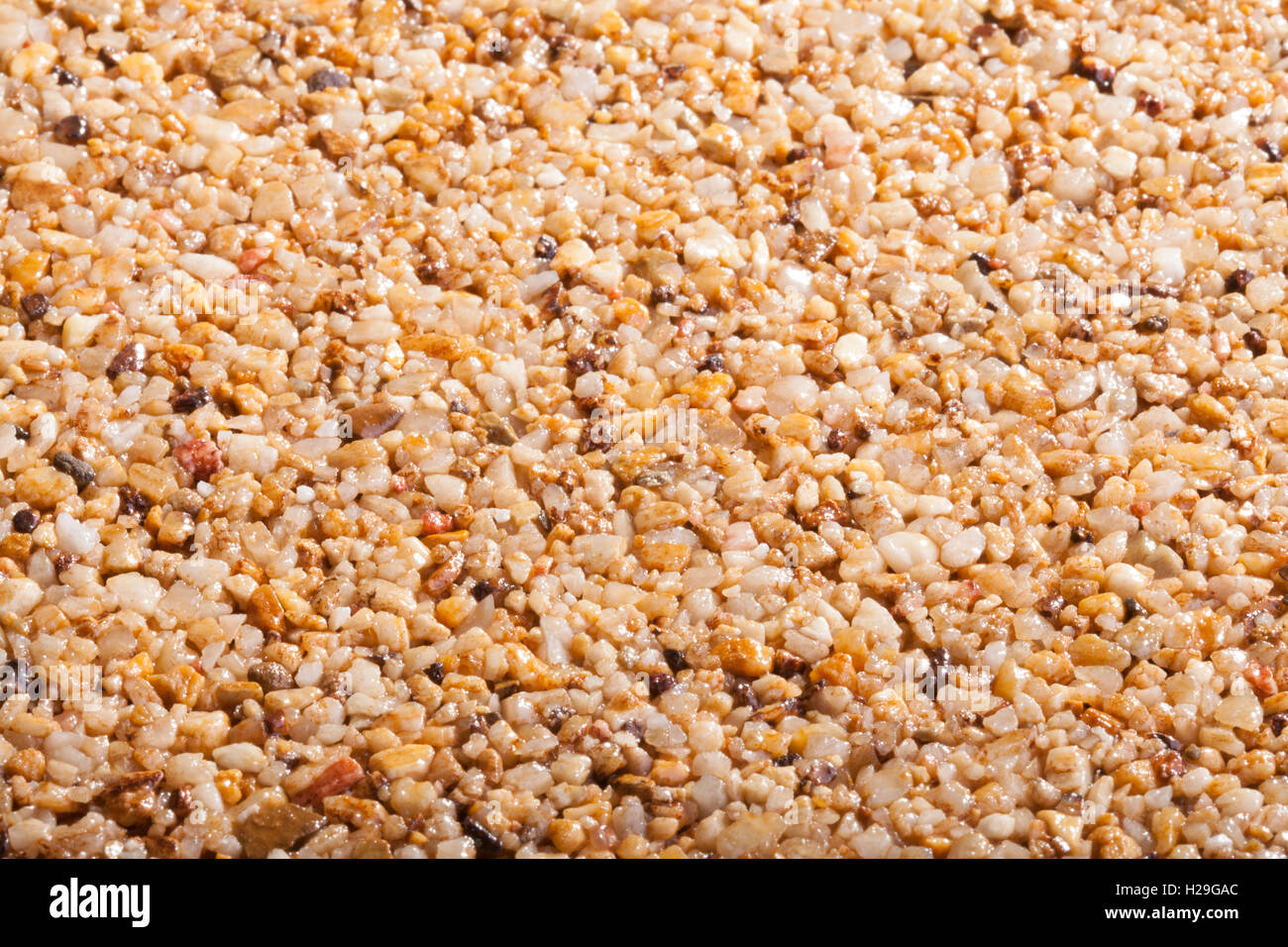 Coloured stone chip / gravel surface Stock Photo - Alamy