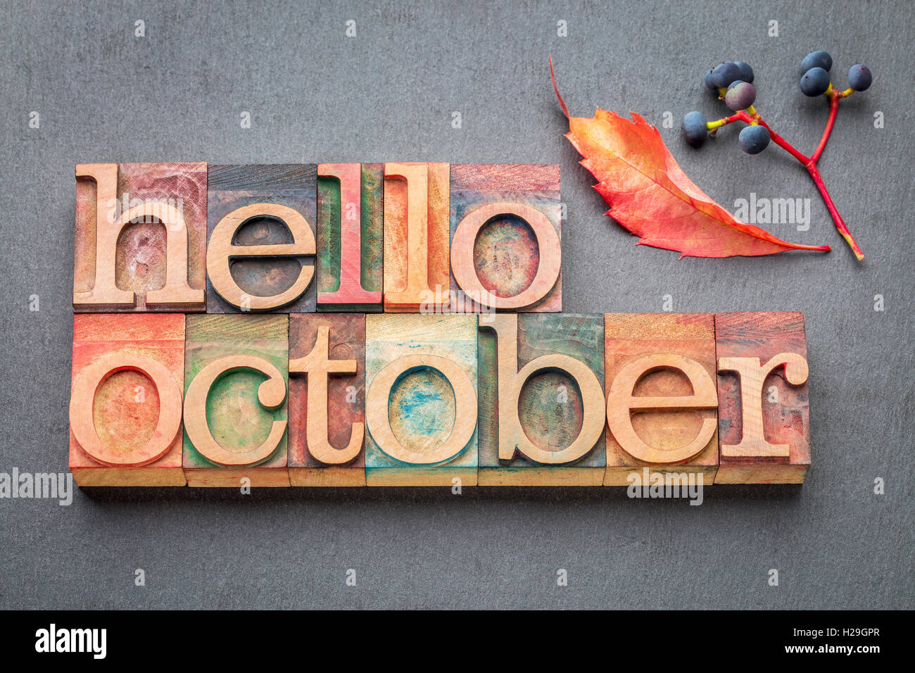 hello October greeting card - letterpress wood type blocks against gray ...