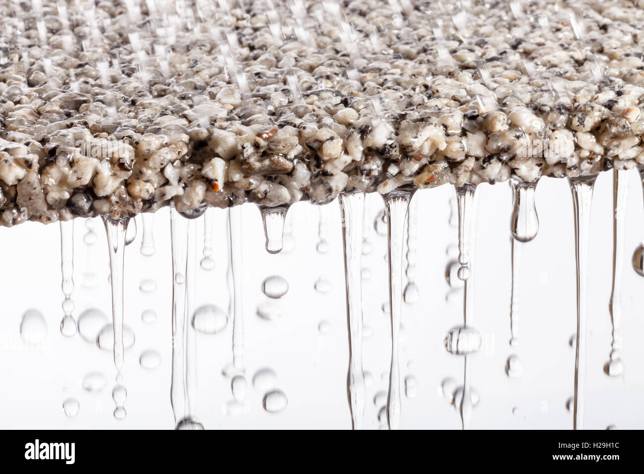 Stone chip surface with water pouring through Stock Photo - Alamy