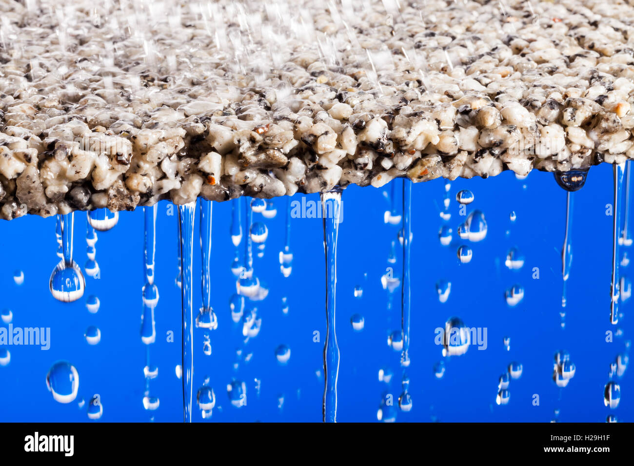 Stone chip surface with water pouring through Stock Photo - Alamy