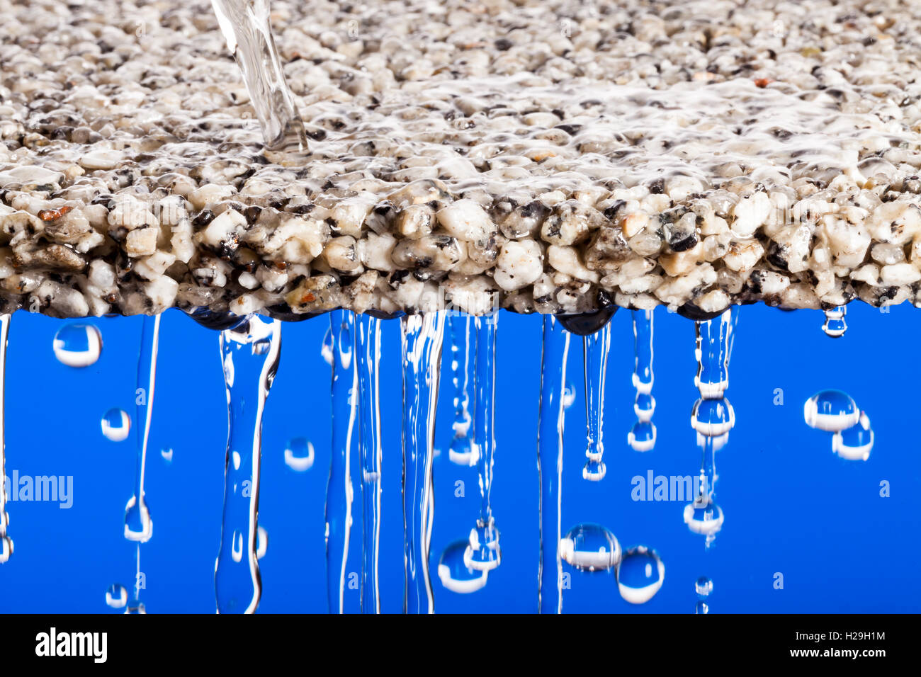 Stone chip surface with water pouring through Stock Photo - Alamy