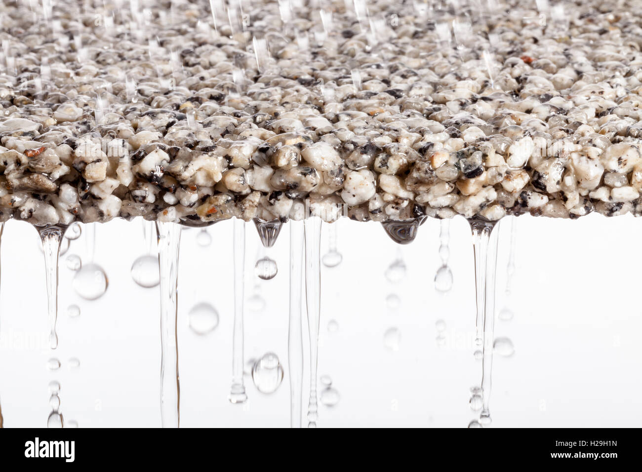 Stone chip surface with water pouring through Stock Photo - Alamy