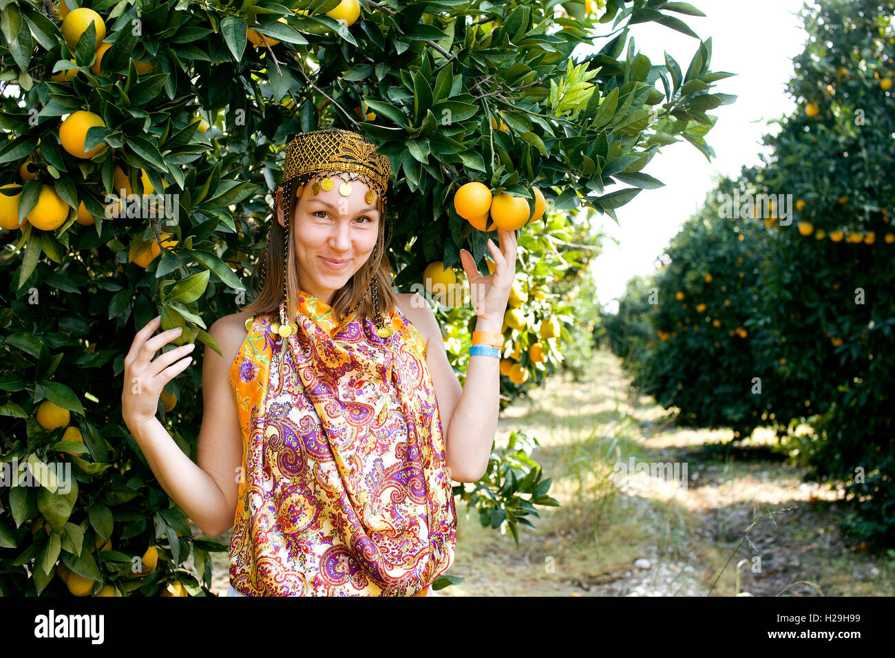 pretty islam woman in orange grove smiling, real muslim girl cheerful ...
