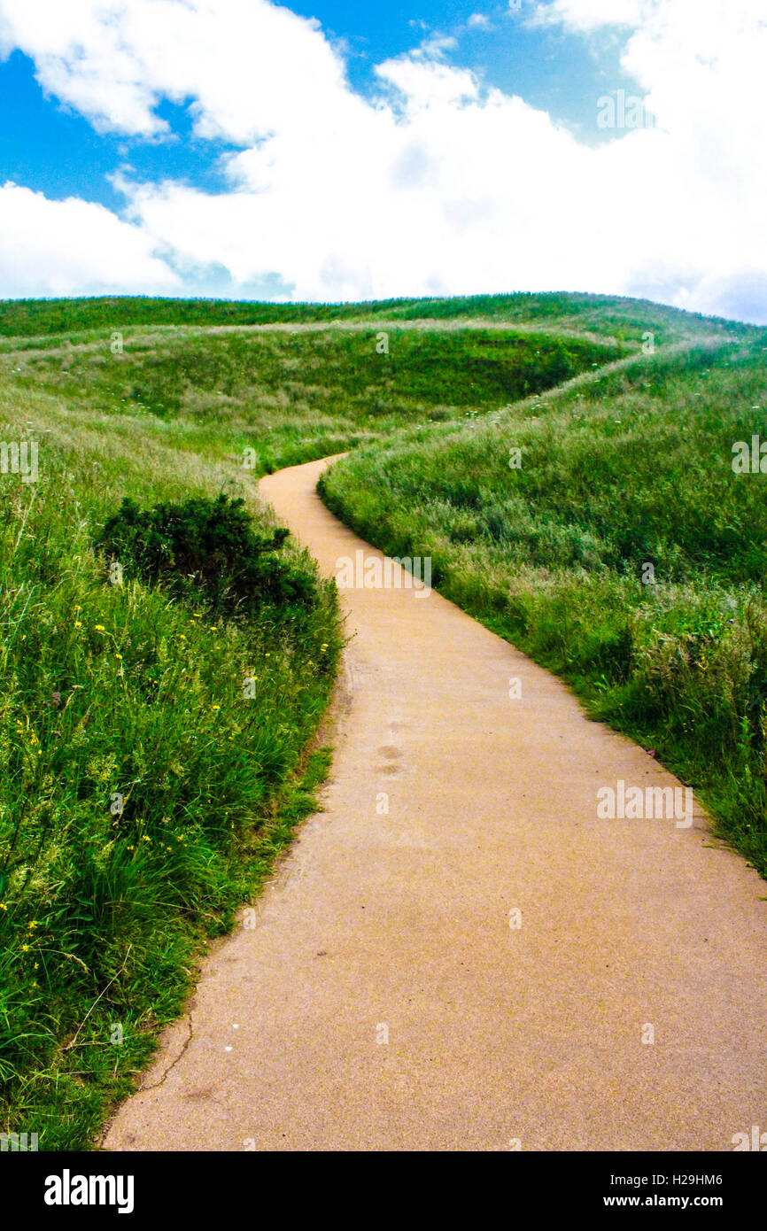 Pathway through the hills Stock Photo - Alamy
