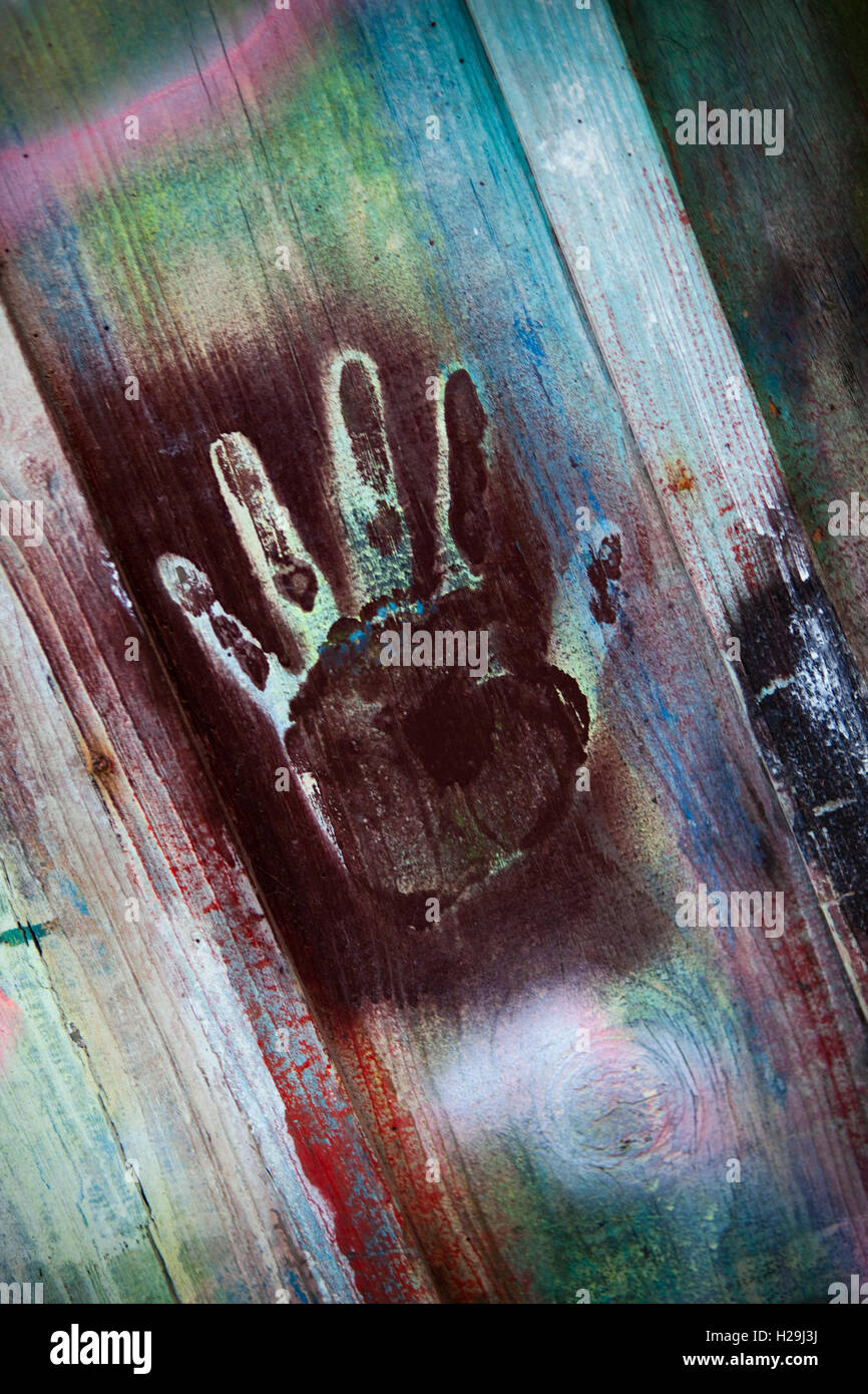 Dirty fingerprints on a wooden colorful wall Stock Photo - Alamy