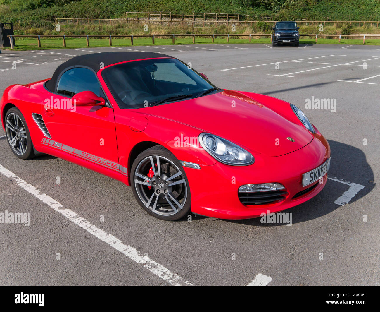 A red Porsche Boxter S sports roadster motor car Stock Photo - Alamy
