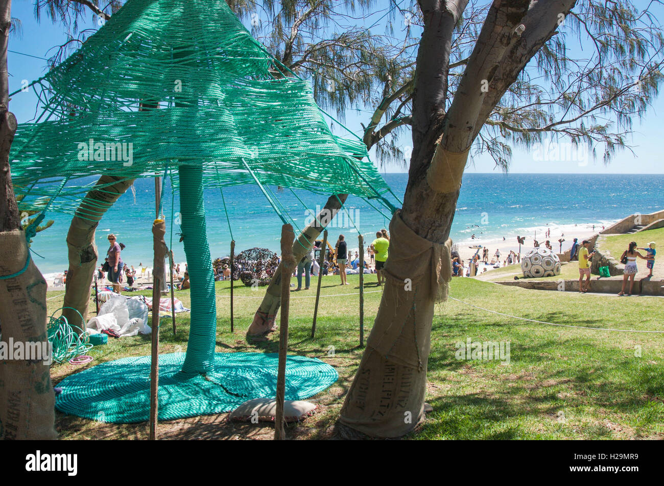 Cottesloe,WA,Australia-March 12,2016:Green tree weaving at the public ...