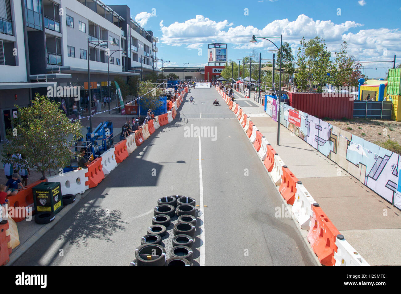 Cockburn,WA,Australia-March 13,2016:Two people racing billy carts with ...