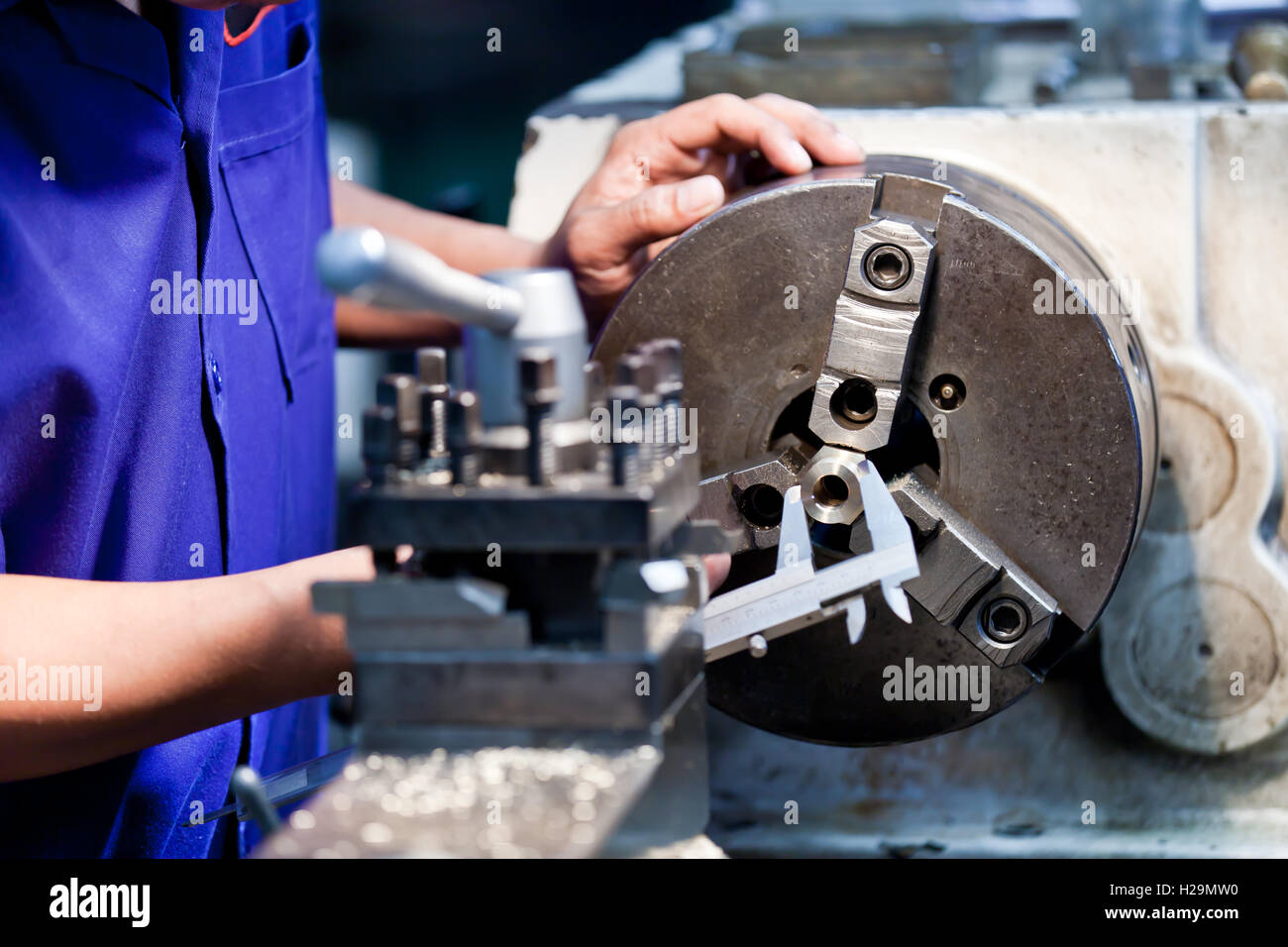 Lathe operator working in factory hi-res stock photography and images ...