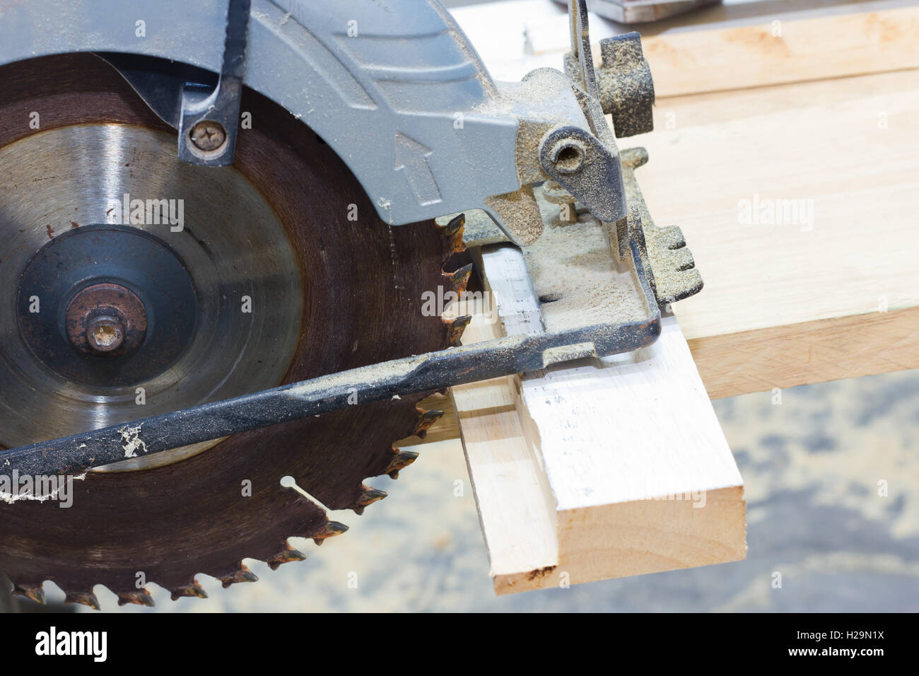 Close up electric circular saw cutting wood Stock Photo - Alamy