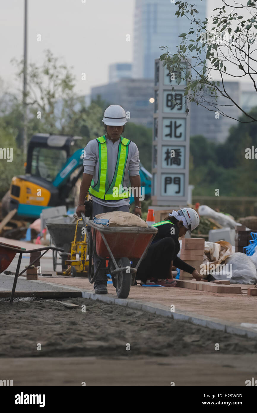 A construction worker continues working at the new Tokyo Metropolitan ...