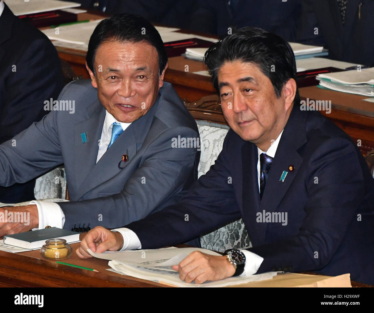 Tokyo, Japan. 26th Sep, 2016. Japan's Prime Minister Shinzo Abe, right ...