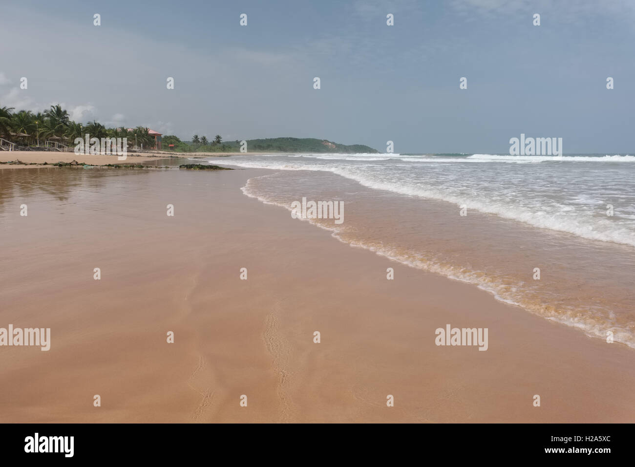 Deserted undeveloped golden sandy beach at Busua Beach in Ghana Stock ...