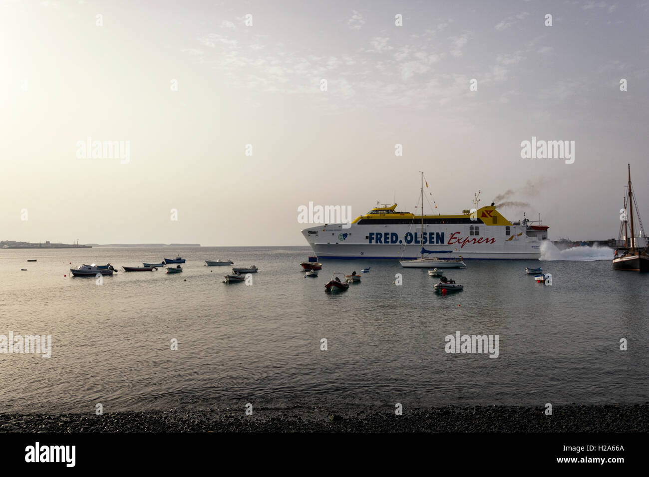 Early morning Playa Blanca at the harbour Stock Photo - Alamy