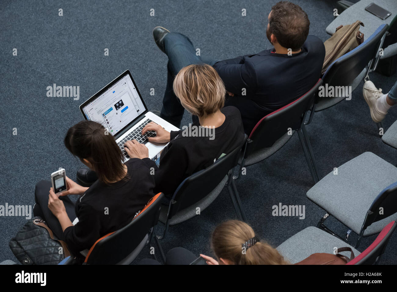 People attend Digital Marketing Conference in big hall Stock Photo - Alamy