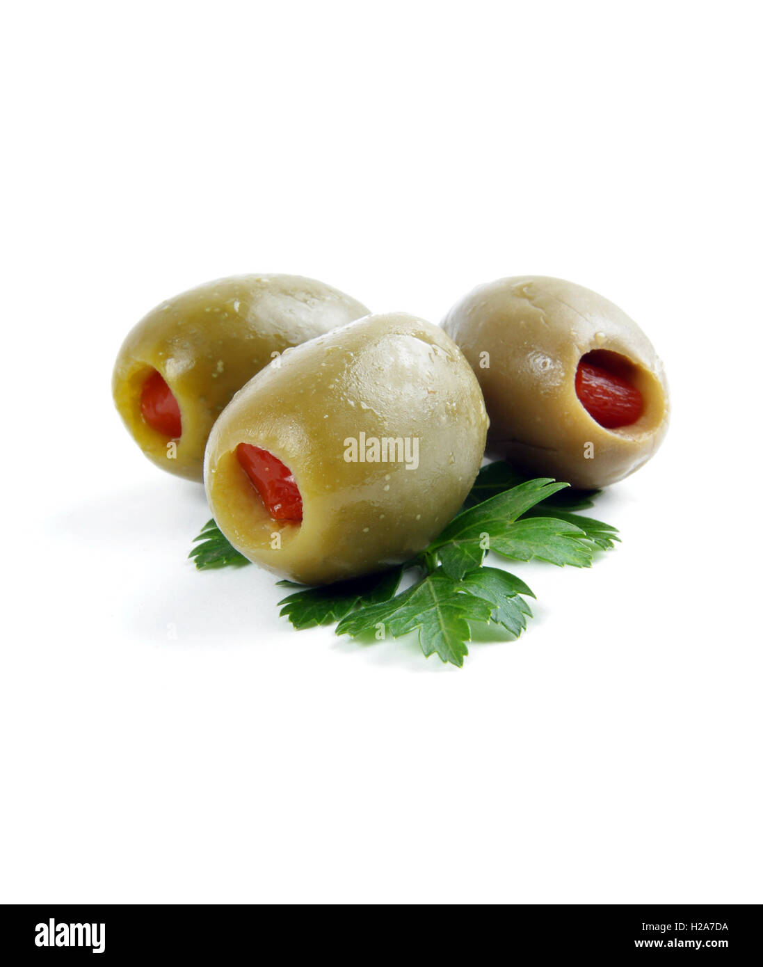 closeup of green stuffed olives Stock Photo - Alamy