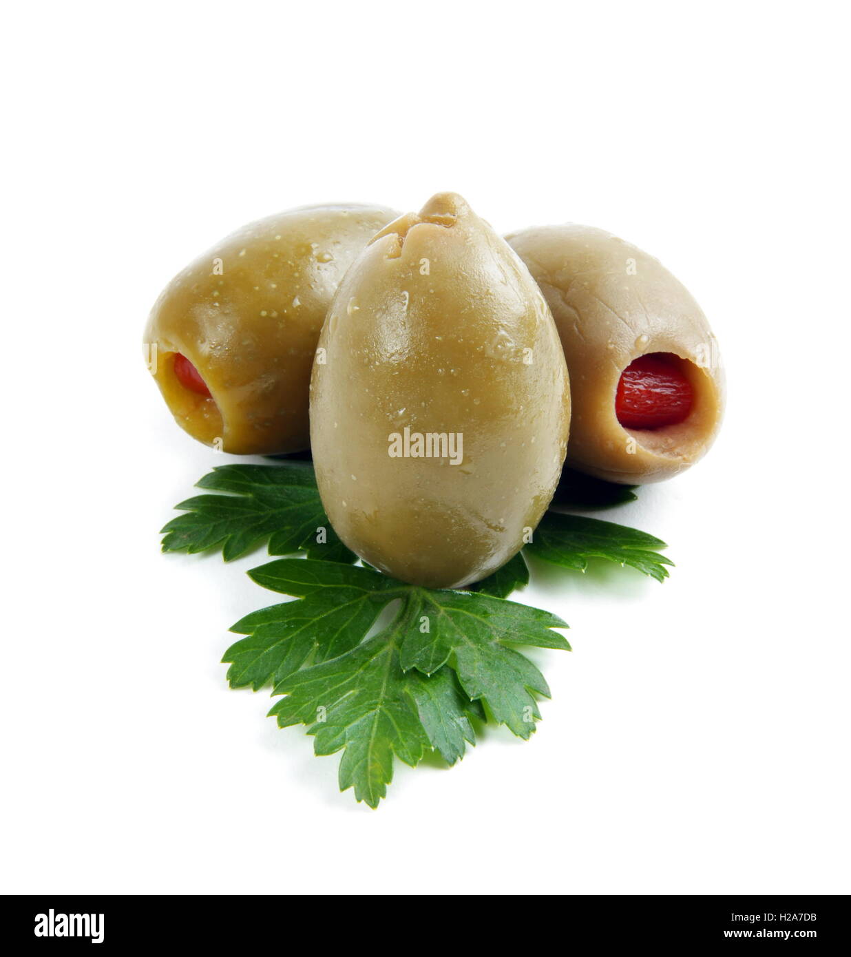 closeup of green stuffed olives Stock Photo - Alamy