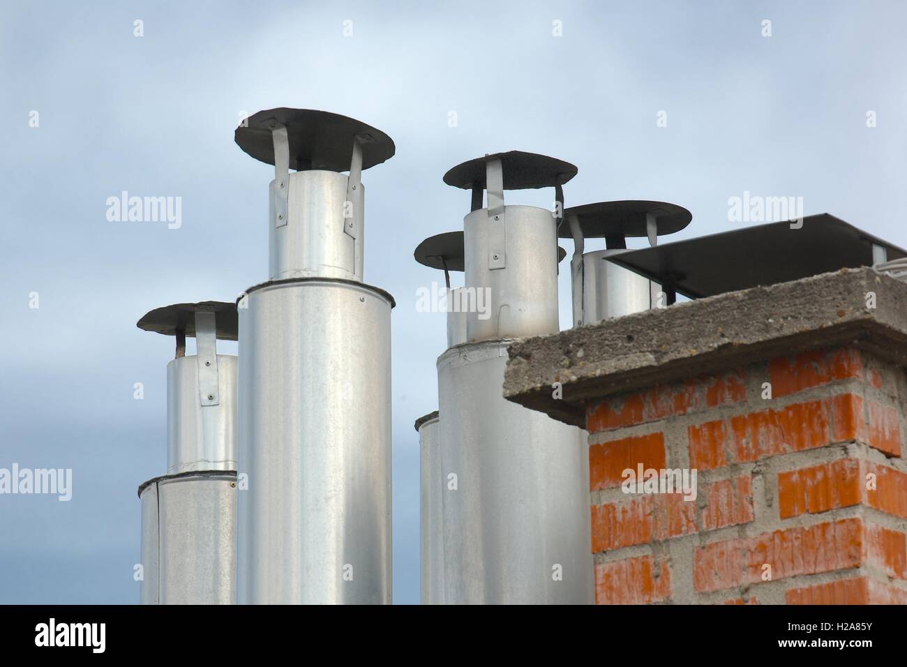 Roofs and chimneys Stock Photo - Alamy
