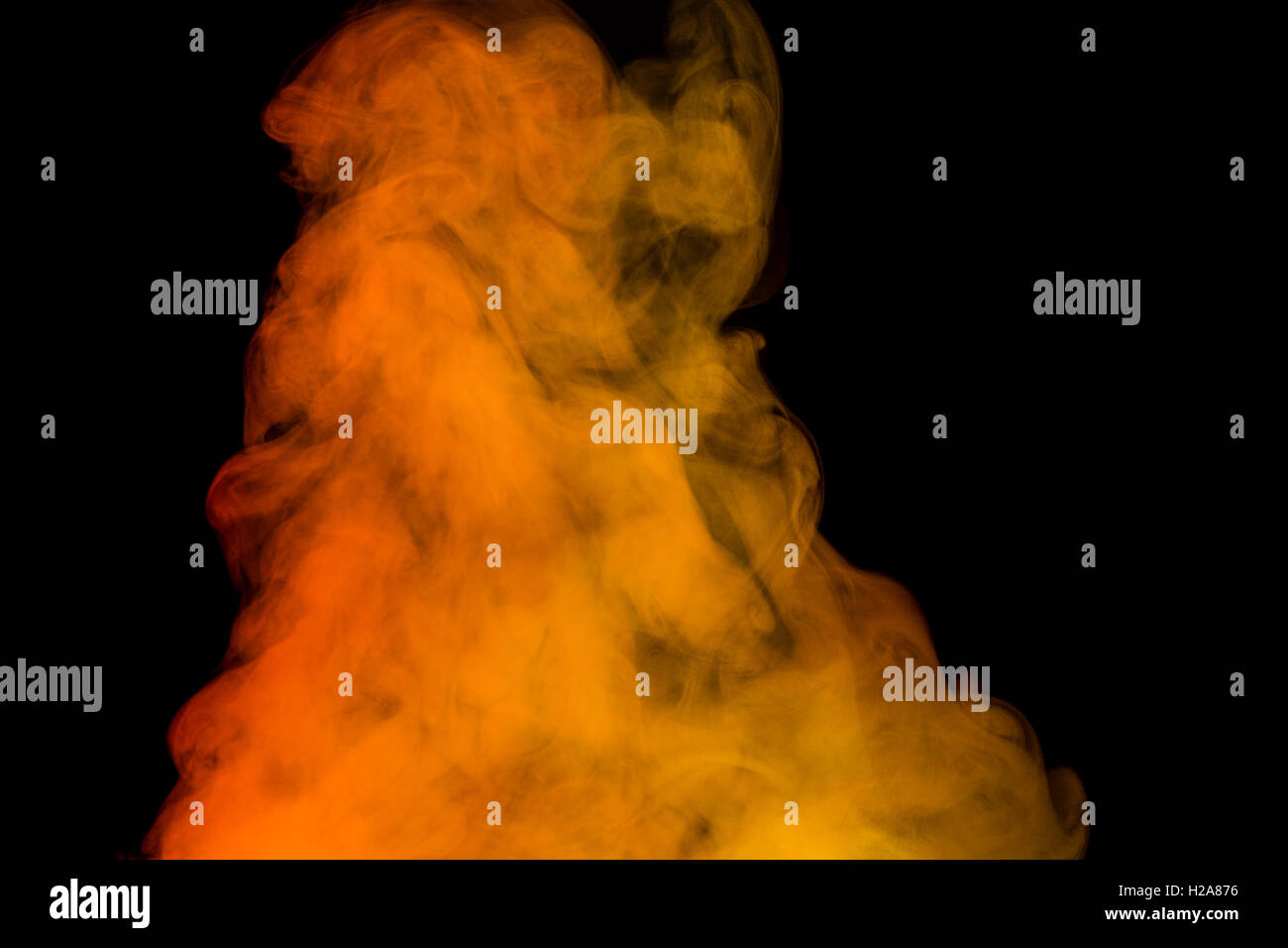 Abstract red yellow water vapor on a black background. Texture. Design ...