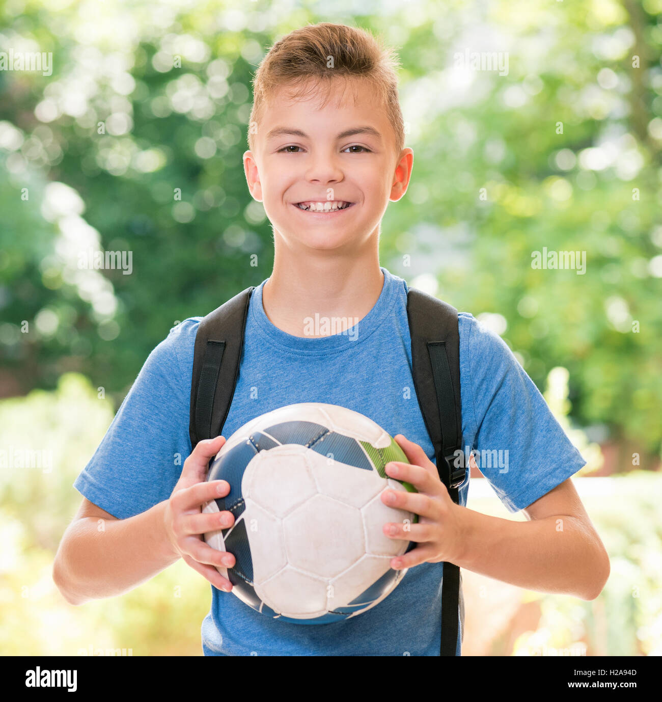 Boy outside university hi-res stock photography and images - Alamy