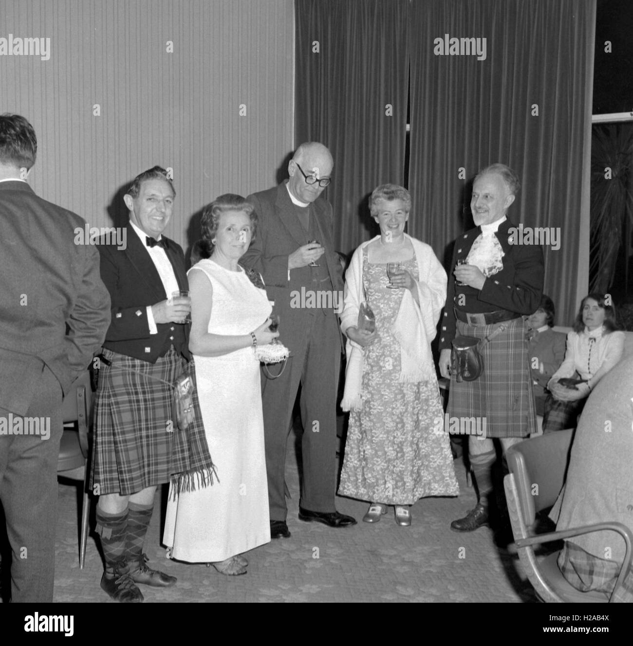 Both wearing kilts Black and White Stock Photos & Images - Alamy