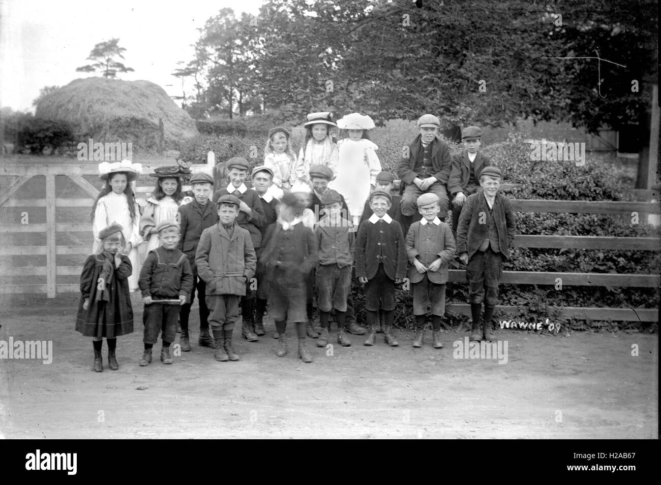 Children posing from Wawne Village, East Riding, Yorkshire in 1909 ...