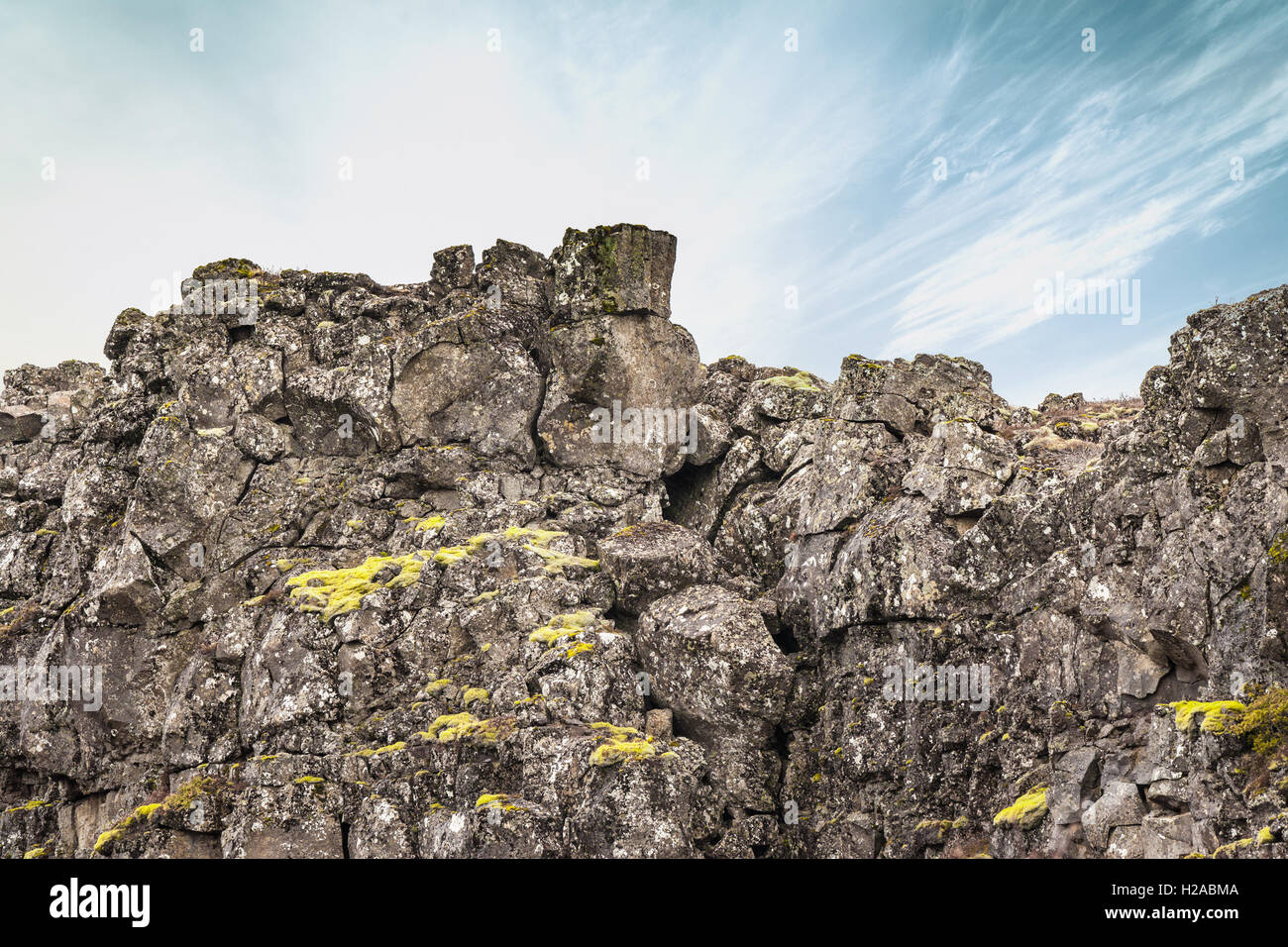 Rough cliffs with green moss in Iceland Stock Photo - Alamy