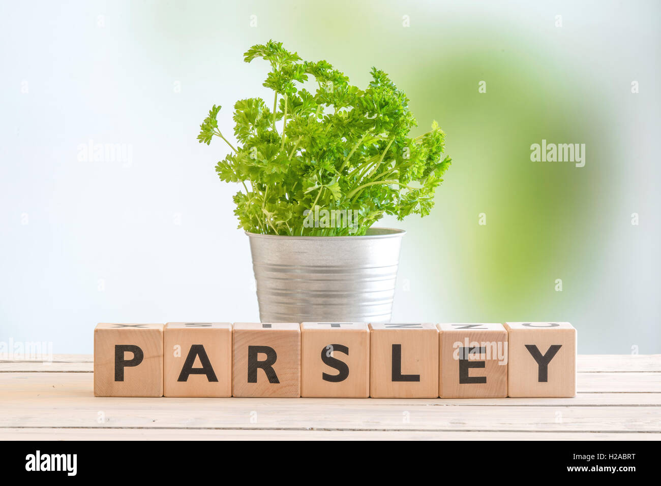 Parsley sign on a table with fresh herbs Stock Photo - Alamy