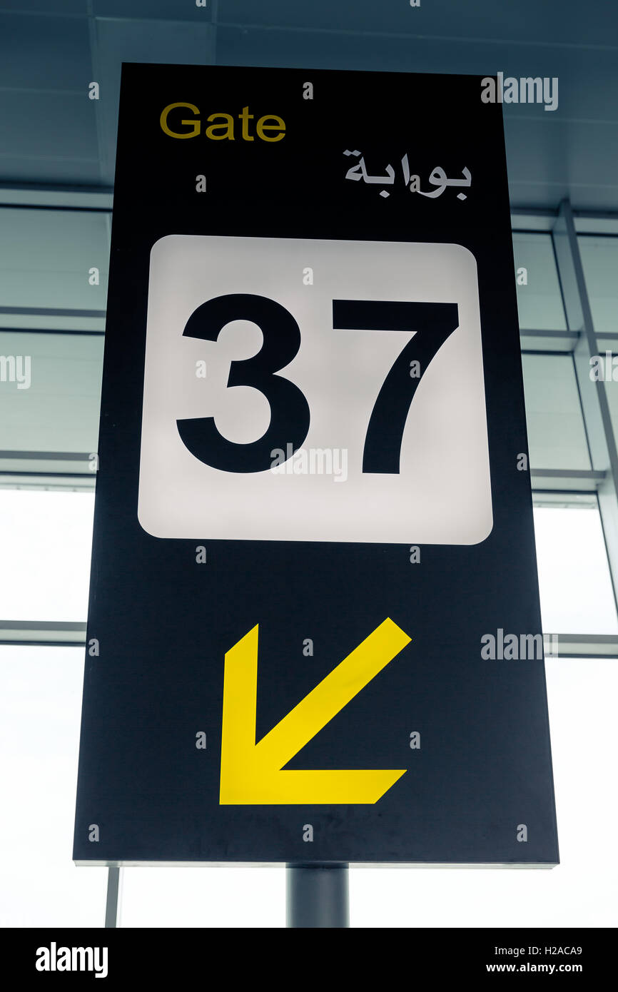 Black Airport Pointers - Gate direction Stock Photo - Alamy