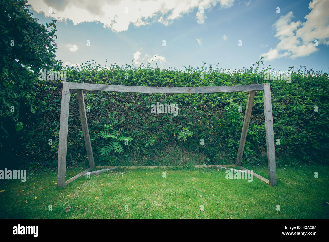 Soccer goal made of wood in a backyard Stock Photo - Alamy