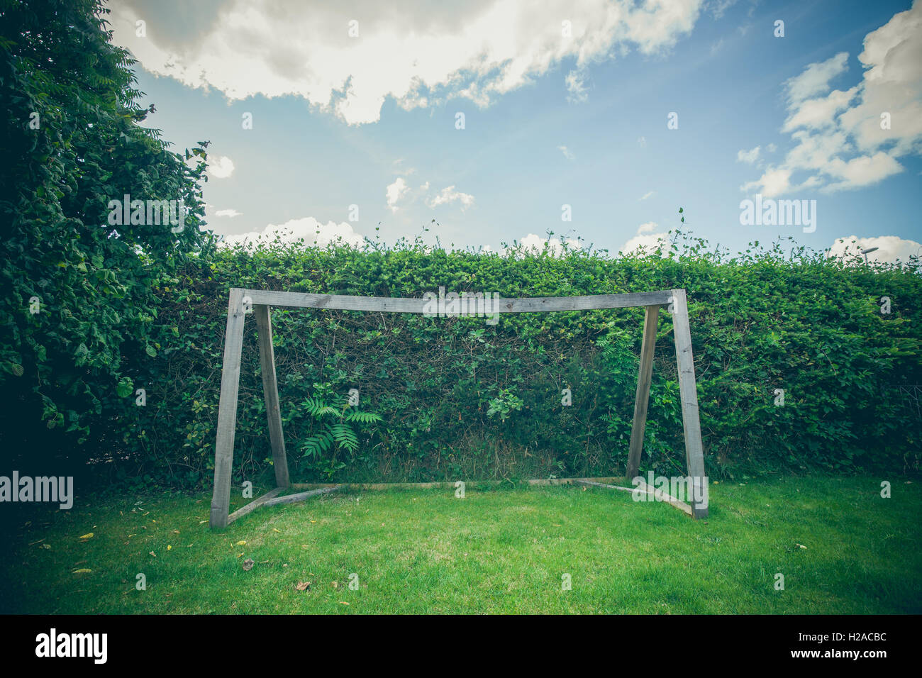 Backyard soccer goal on a green lawn in the summer Stock Photo - Alamy