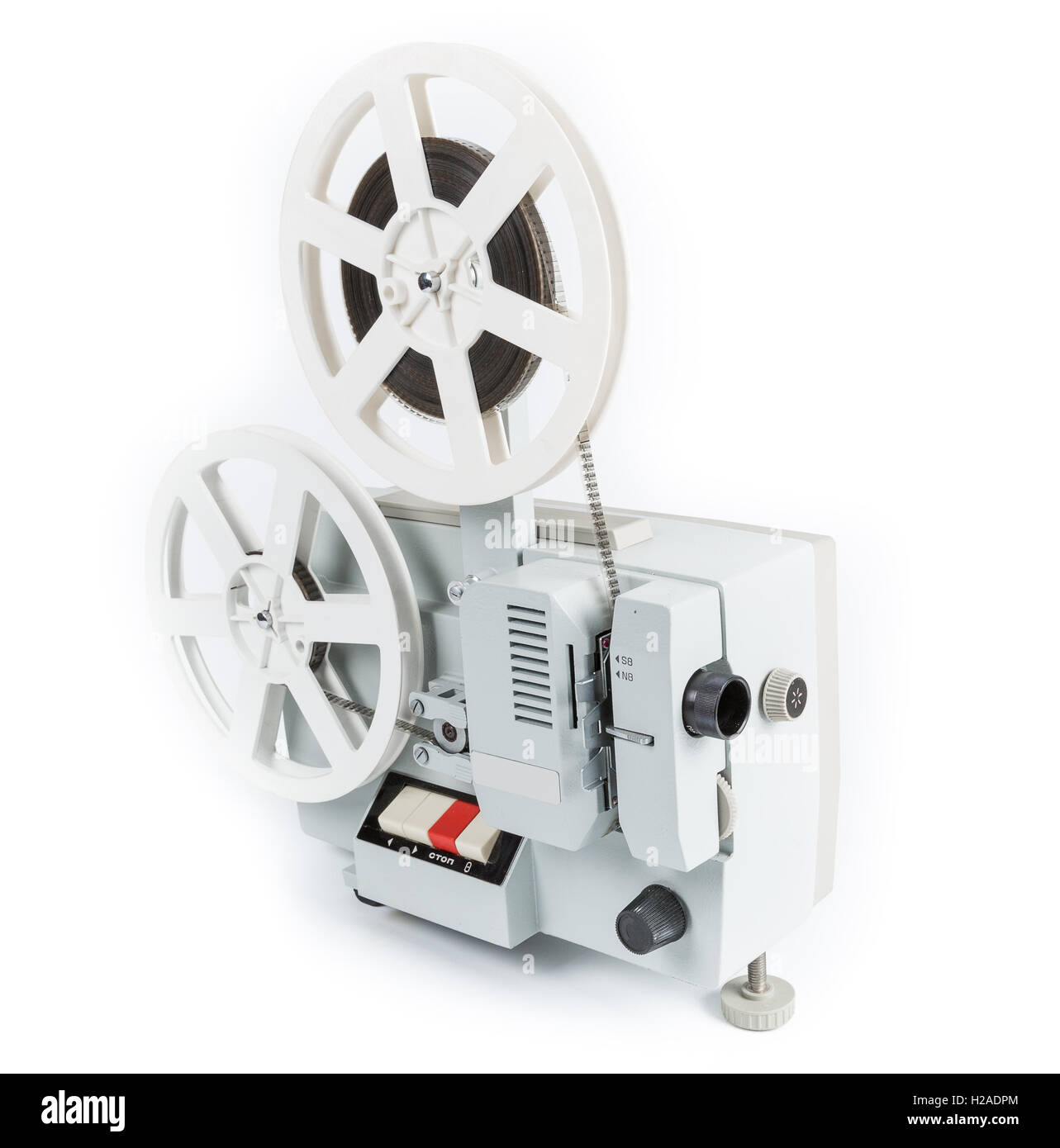 Old film projector isolated on a white background Stock Photo - Alamy
