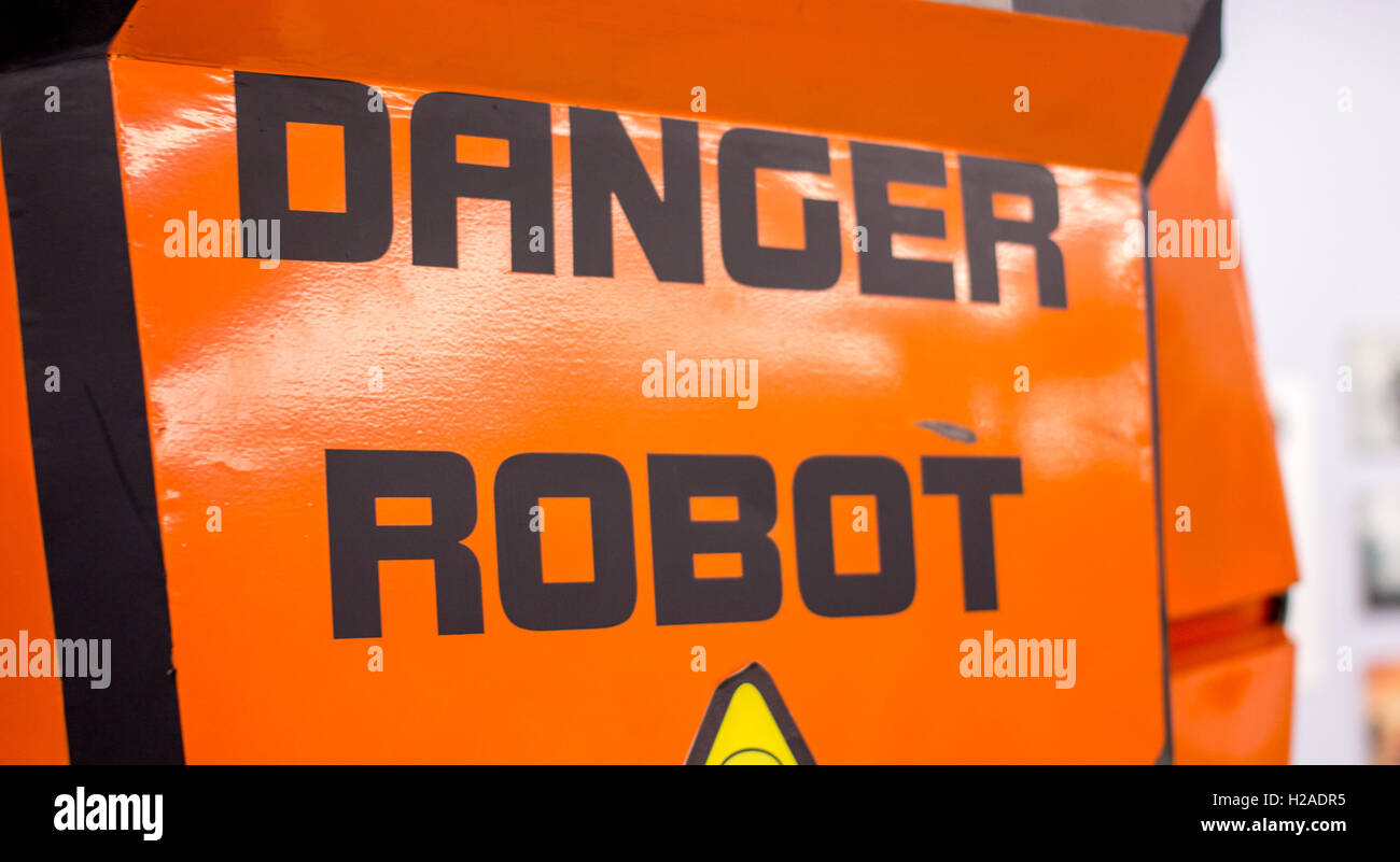 "Danger robot" sign on orange background Stock Photo - Alamy