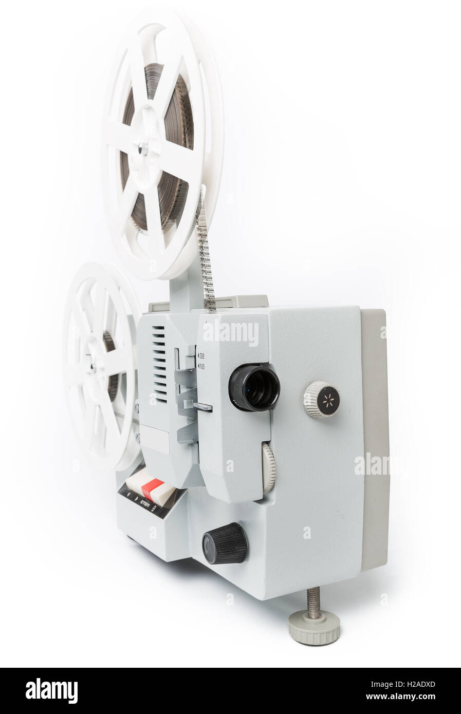 Old film projector isolated on a white background Stock Photo - Alamy