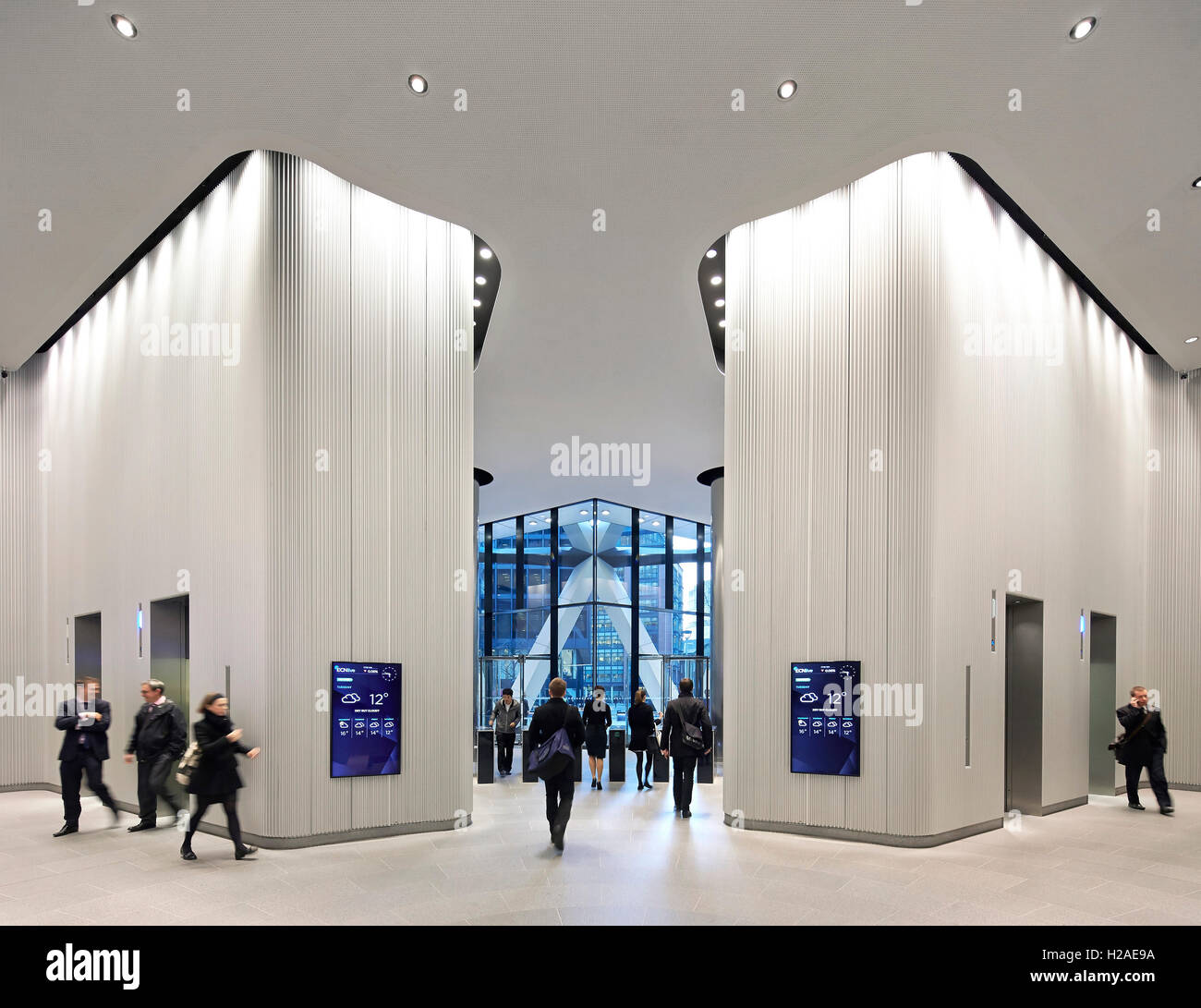 Reception foyer with security barriers and elevators. The Gherkin ...