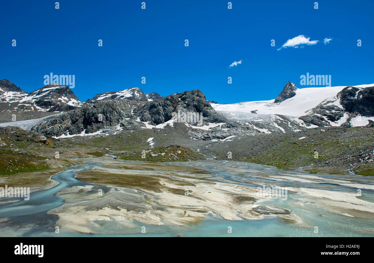 Rutor glacier, Le Vedette, alpine landscape, fusion lake and creek ...