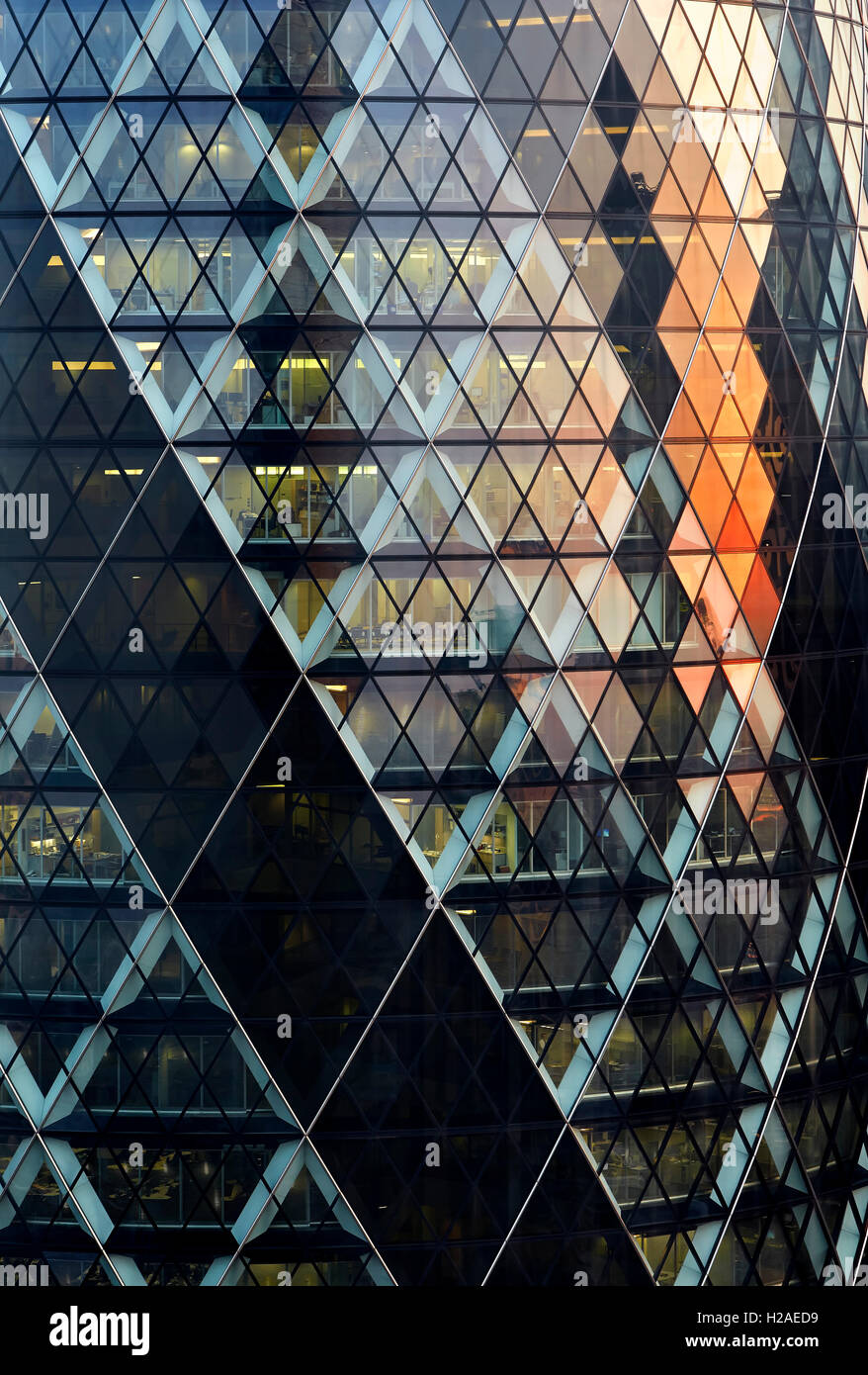 Sunset reflection in facade glazing. The Gherkin, London, United ...