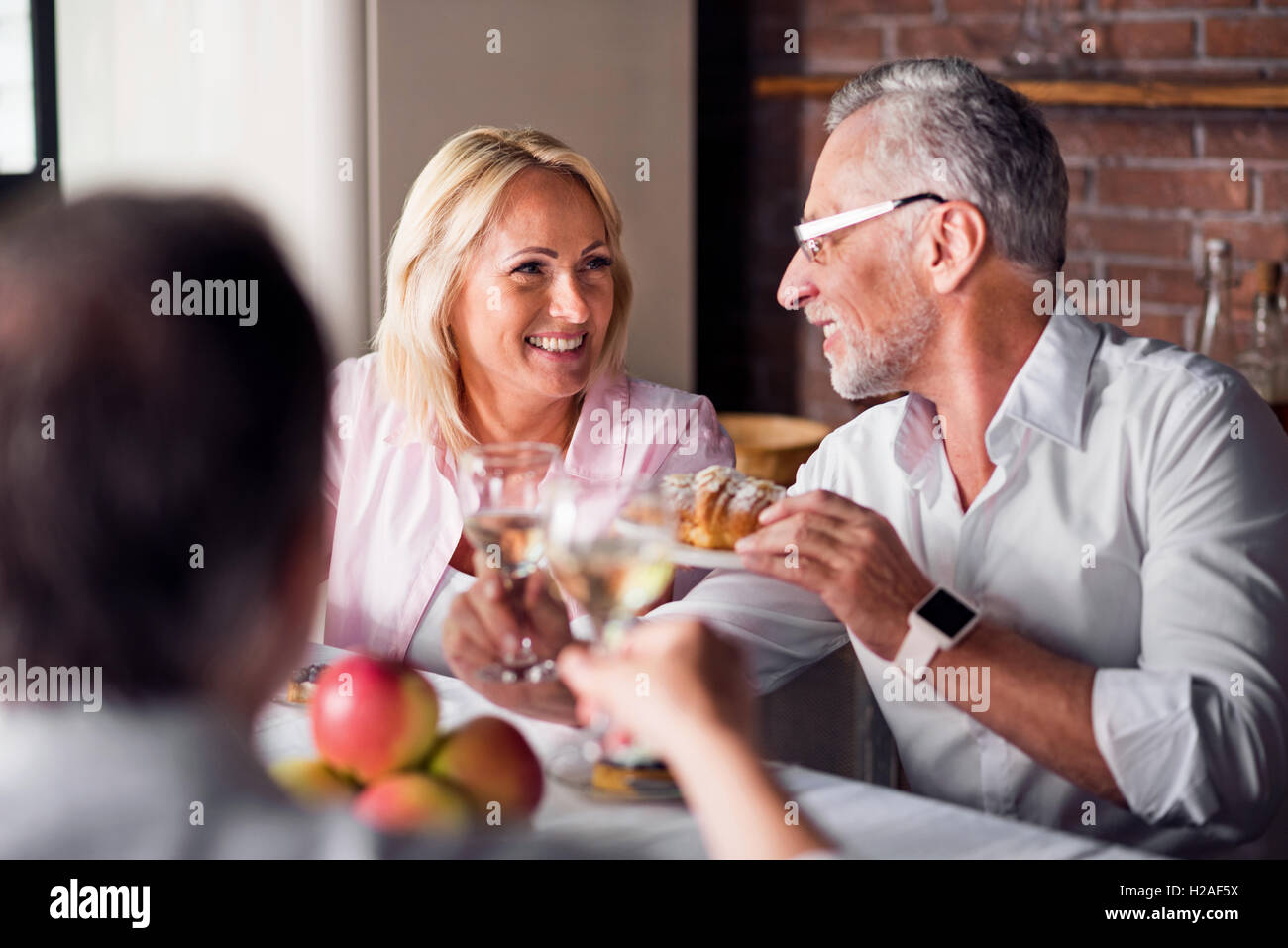 Couple chatting together dinner table hi-res stock photography and ...