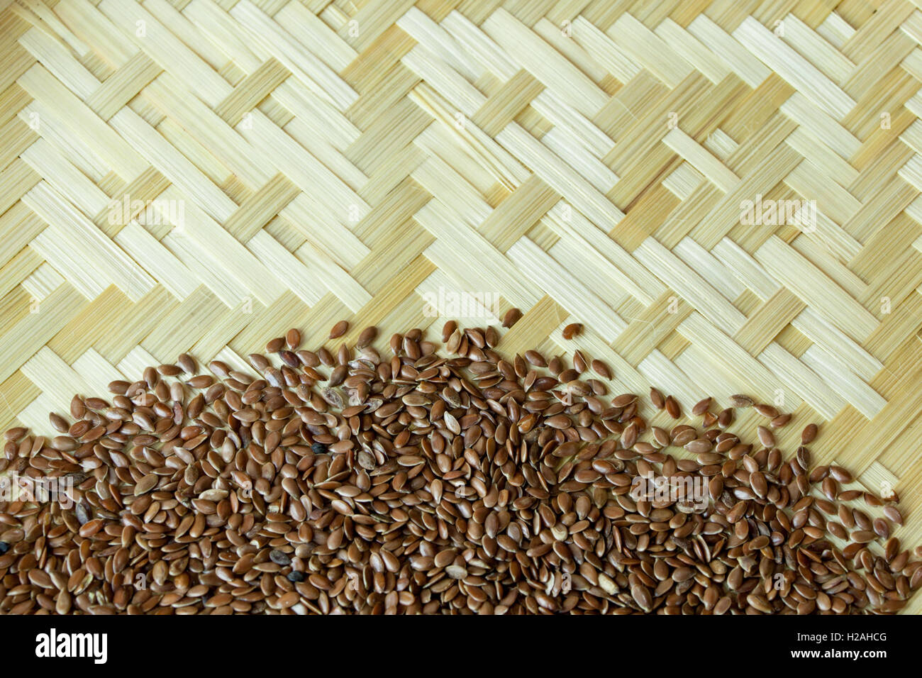 flax seed placed on flat woven basket Stock Photo - Alamy