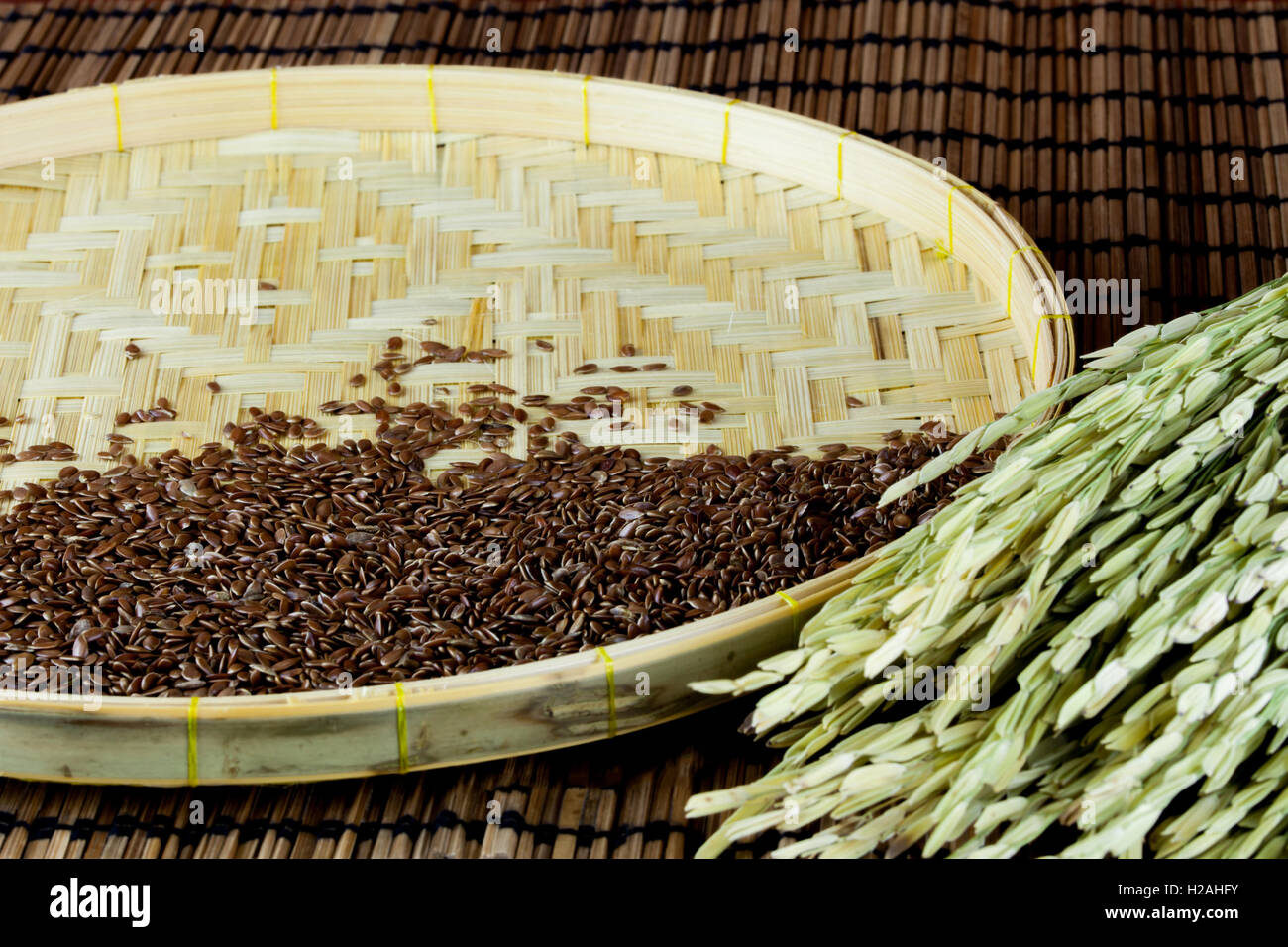 flax seed with raw grain placed on flat woven basket Stock Photo - Alamy