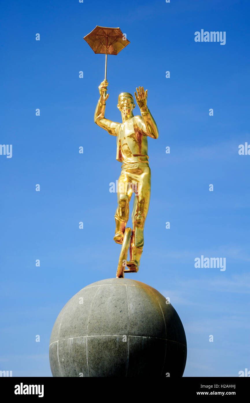 Golden Acrobat statue (clown) riding a bike at Moscow Fountain Circus ...