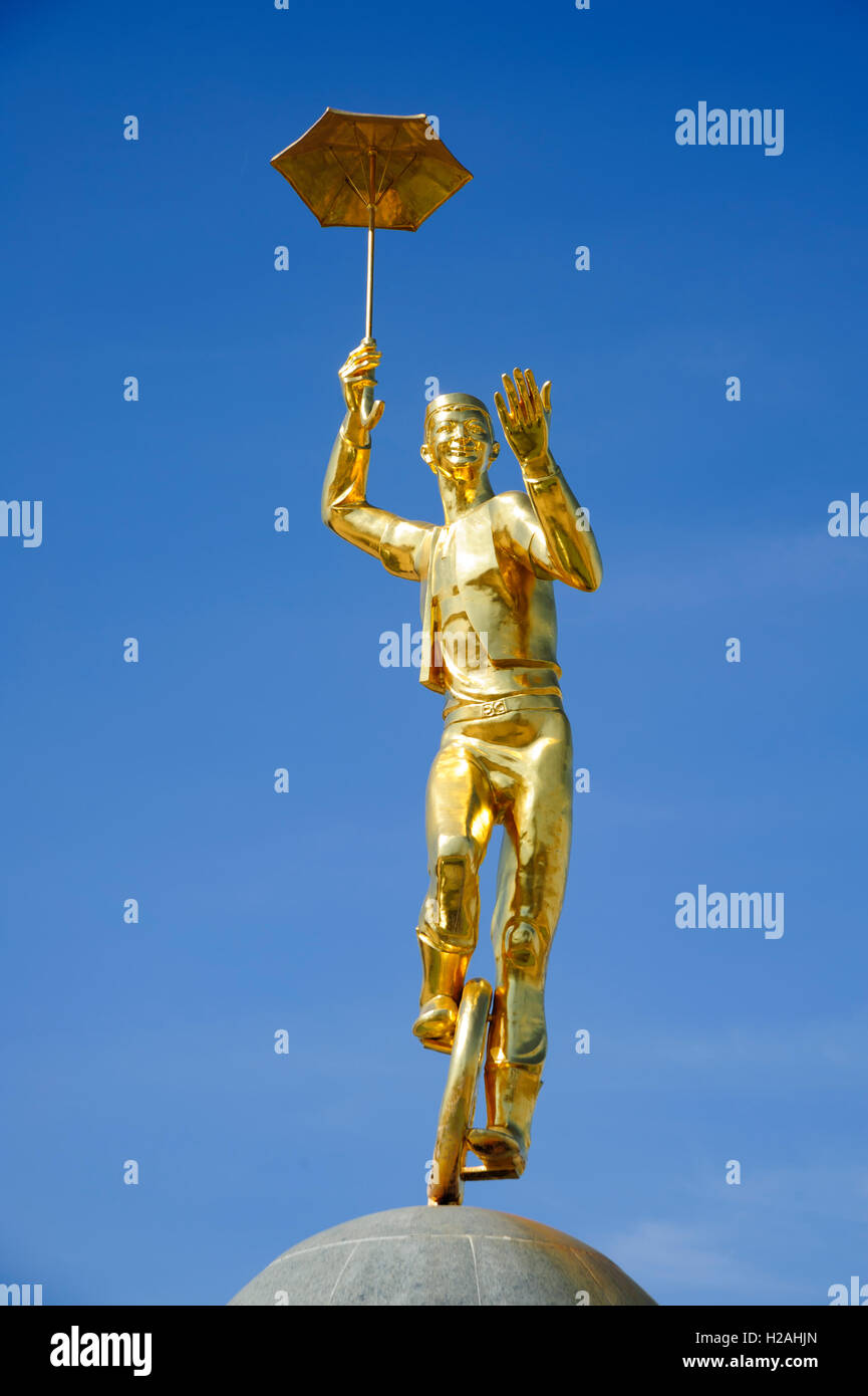 Golden Acrobat statue (clown) riding a bike at Moscow Fountain Circus ...