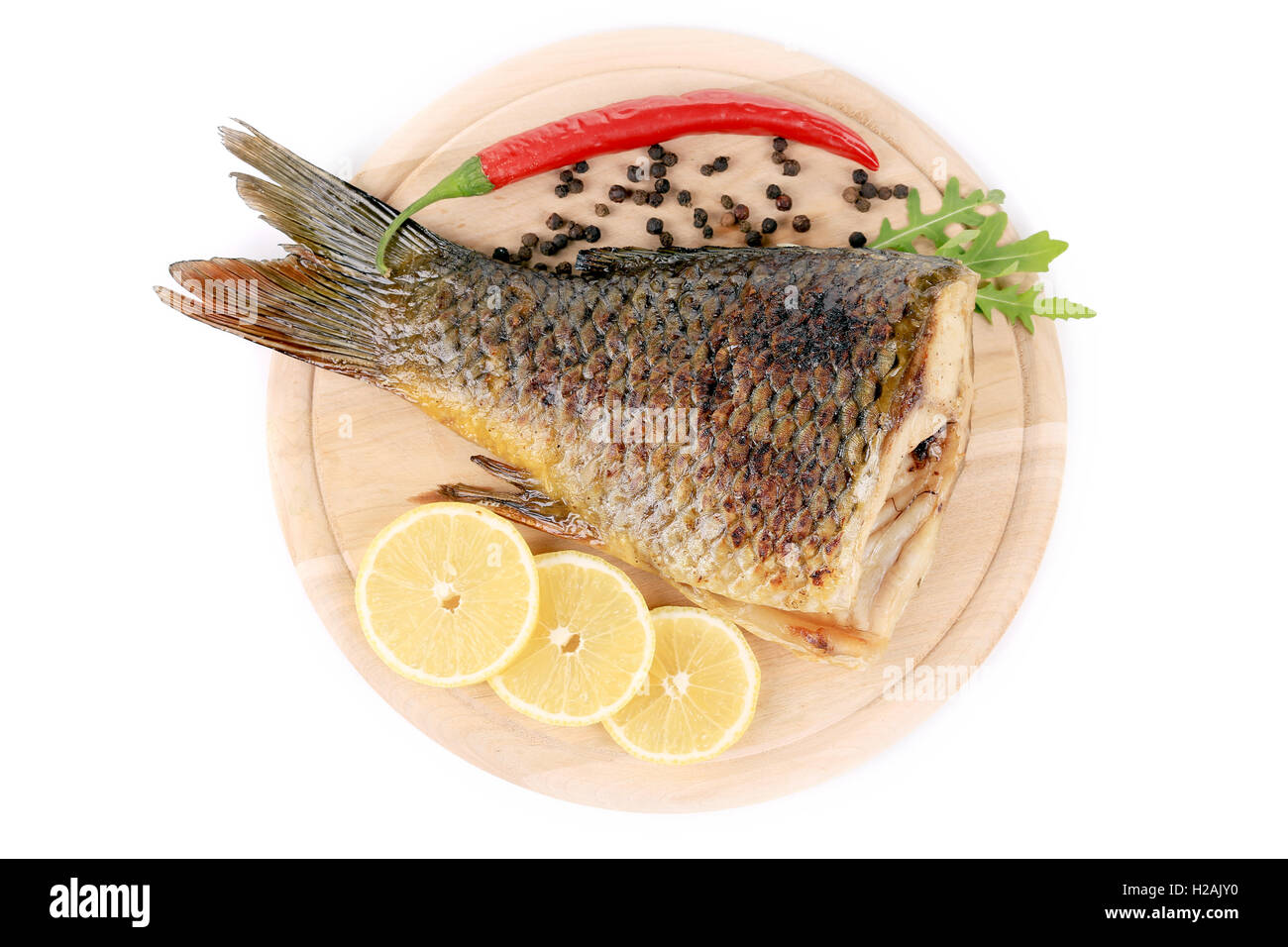 Fried fish tail Stock Photo - Alamy