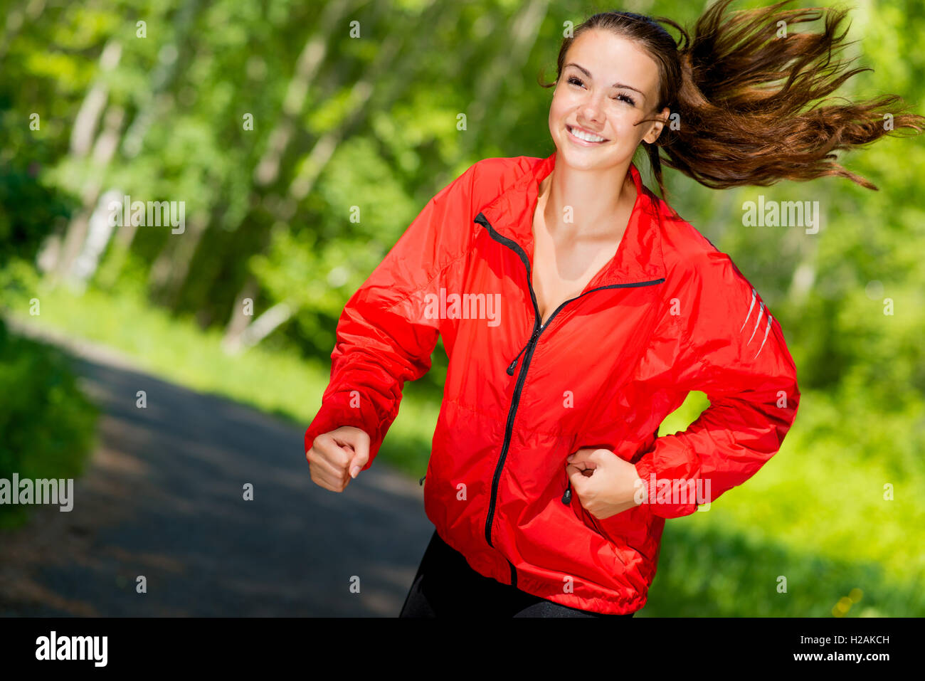 healthy young female athlete running Stock Photo - Alamy