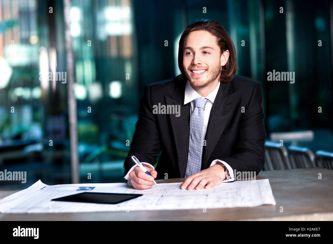 Smart businessman projecting his plans Stock Photo - Alamy