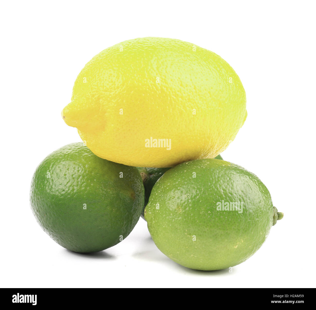 Fresh lime and lemon isolated on white Stock Photo - Alamy
