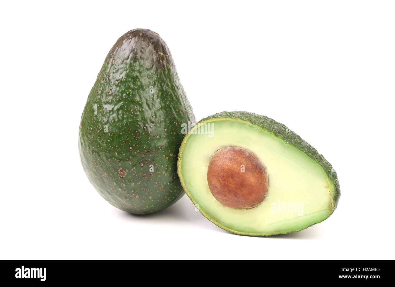 whole and half avocados Stock Photo - Alamy