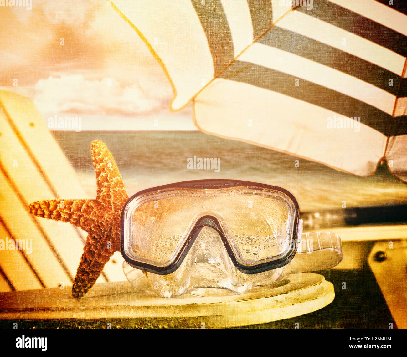 Beach toys on chair at the beach with vintage look Stock Photo - Alamy