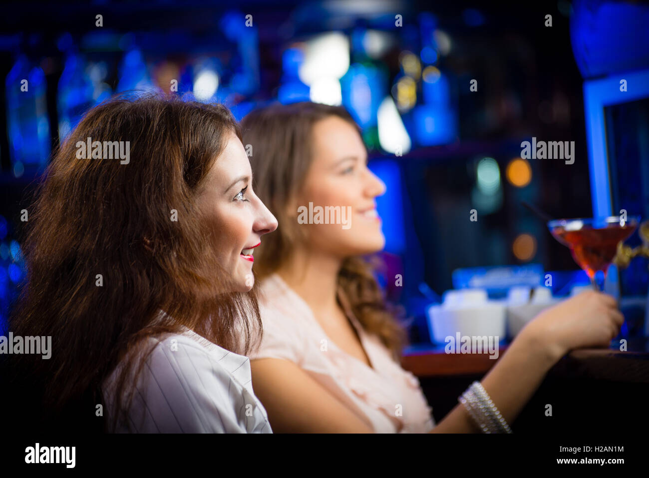 young woman in a bar Stock Photo - Alamy