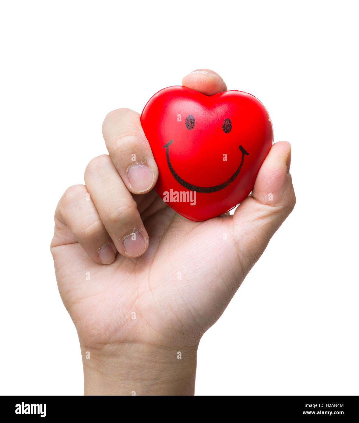 Hand squeezing a stress ball Stock Photo - Alamy